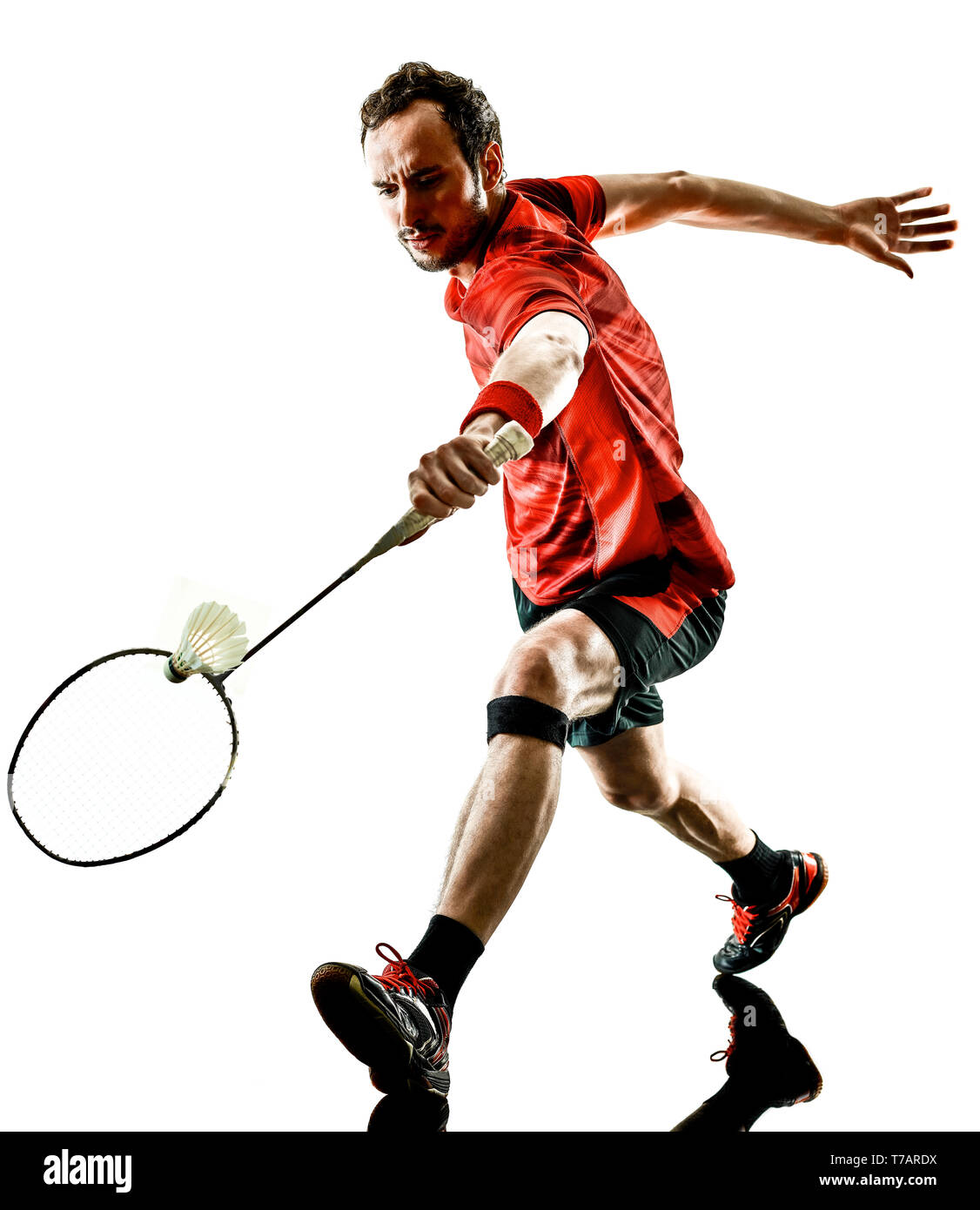 one caucasian Badminton player man in studio shadow silhouette isolated ...