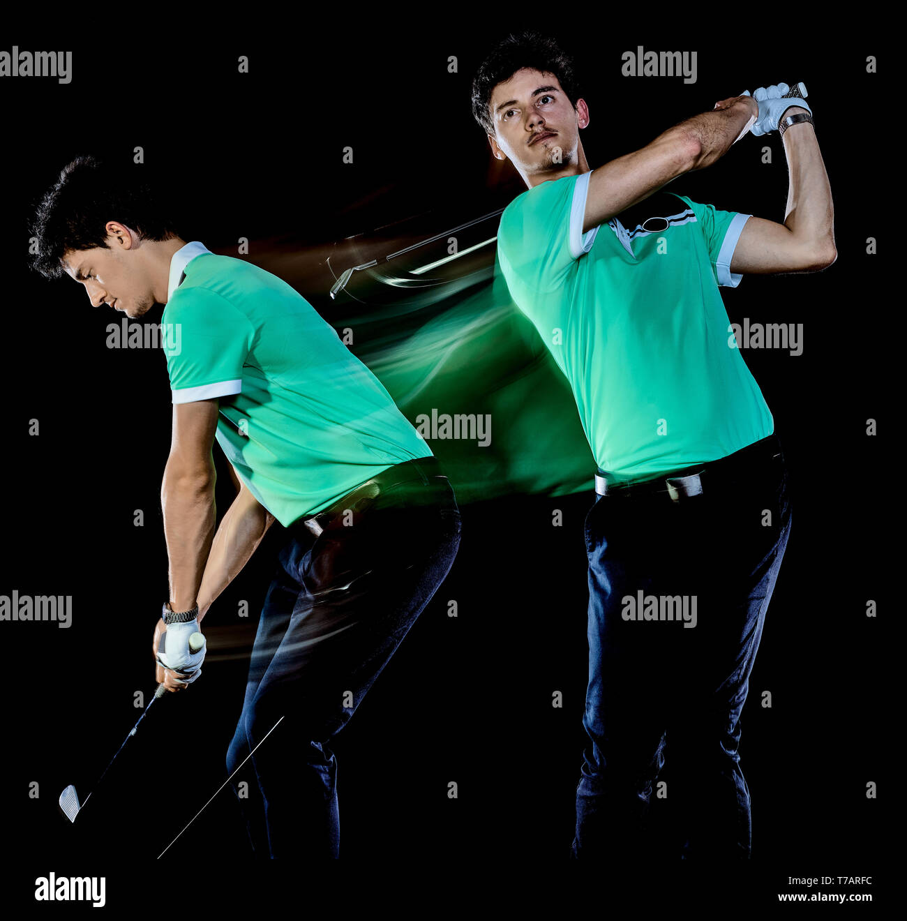 one caucasian young golfer man golfing golf swing isolated on black ...