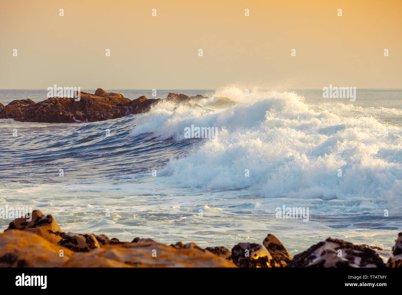 Surf on the sea in the early morning Stock Photo - Alamy