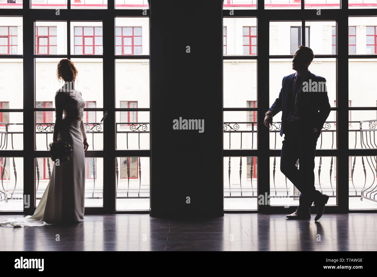 Two silhouette facing each other hi-res stock photography and images ...