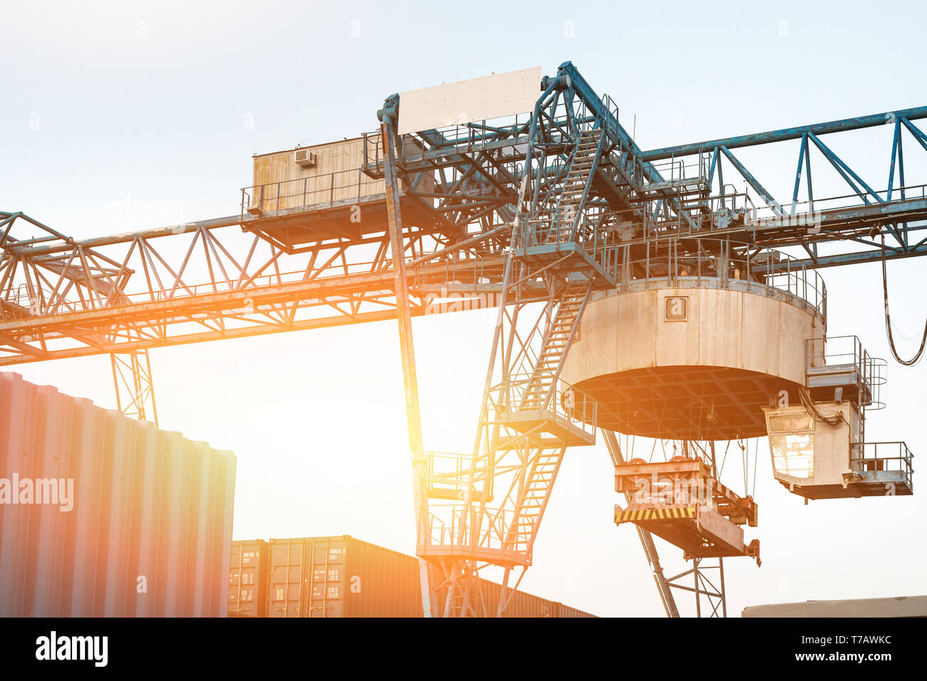 Large port crane unloads cargo containers Stock Photo - Alamy