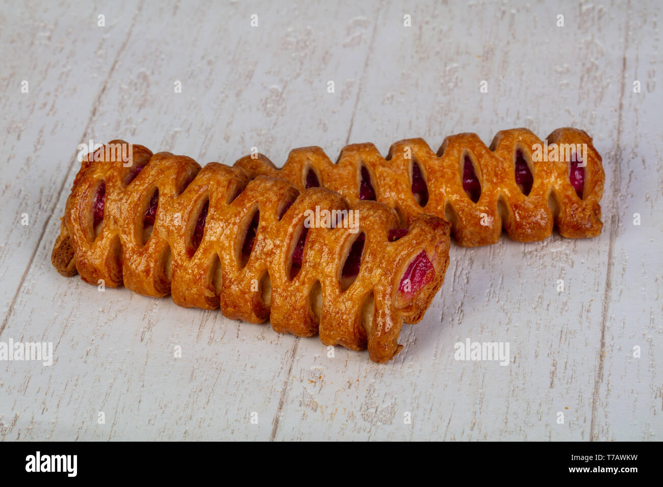 Delicious puff pastry strudel with jam Stock Photo - Alamy