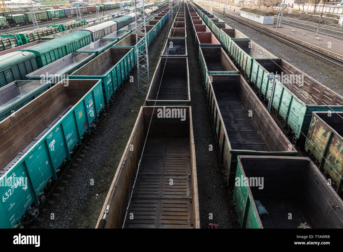 Freight cars at a large railway station. Cargo transportation and ...