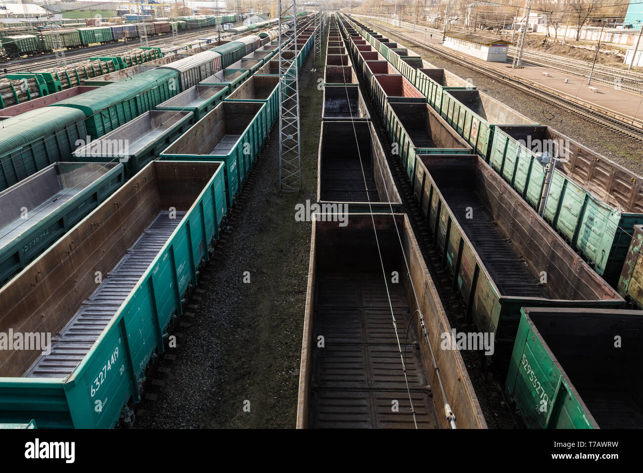Freight cars at a large railway station. Cargo transportation and ...