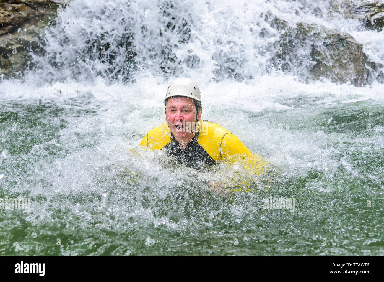 Surfacing after a daring jump into the water Stock Photo - Alamy
