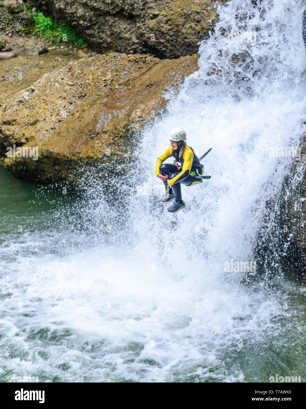 Woman jumping waterfall hi-res stock photography and images - Alamy