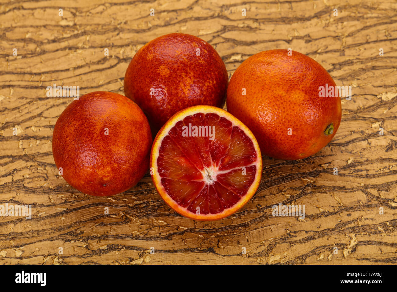 Sweet red orange heap over the table Stock Photo - Alamy