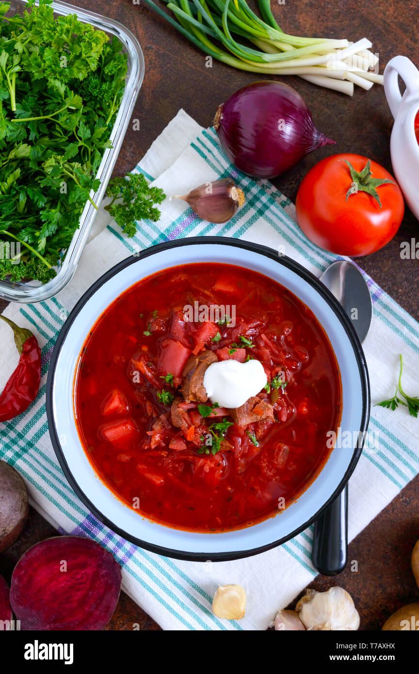 Borsch is a traditional Ukrainian dish in a bowl and products for its ...