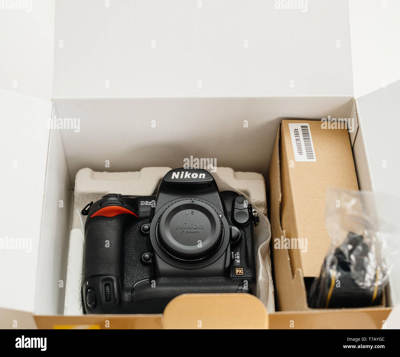Paris, France - Feb 28, 2017: Directly above view of cardboard unboxing ...