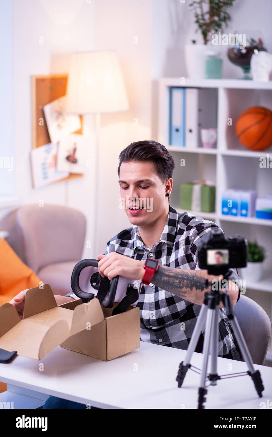 Video features man in white hi-res stock photography and images - Alamy