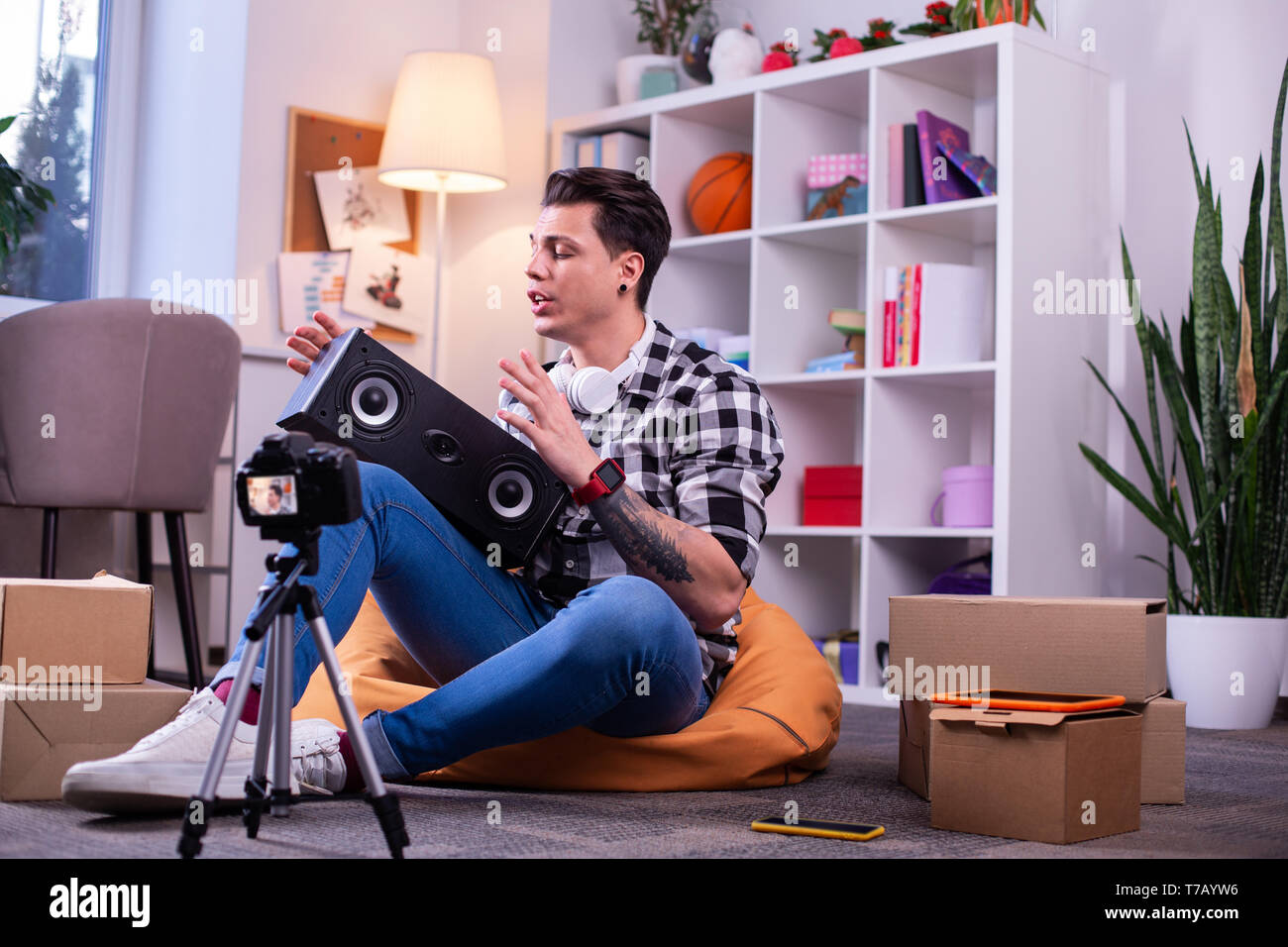 Talkative involved man explaining opportunities of new speaker Stock ...