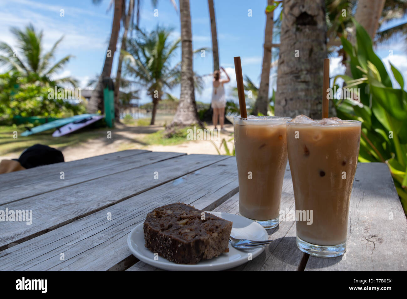 Iced coffee with chocolate bread on the table, Philippines Stock Photo ...