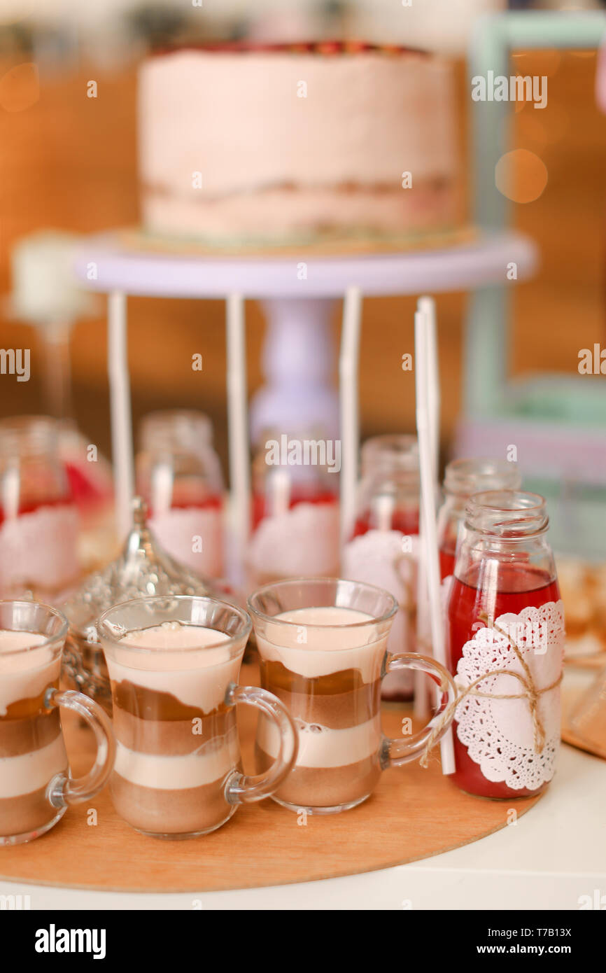 Yummy birthday cake and drinks on table Stock Photo - Alamy