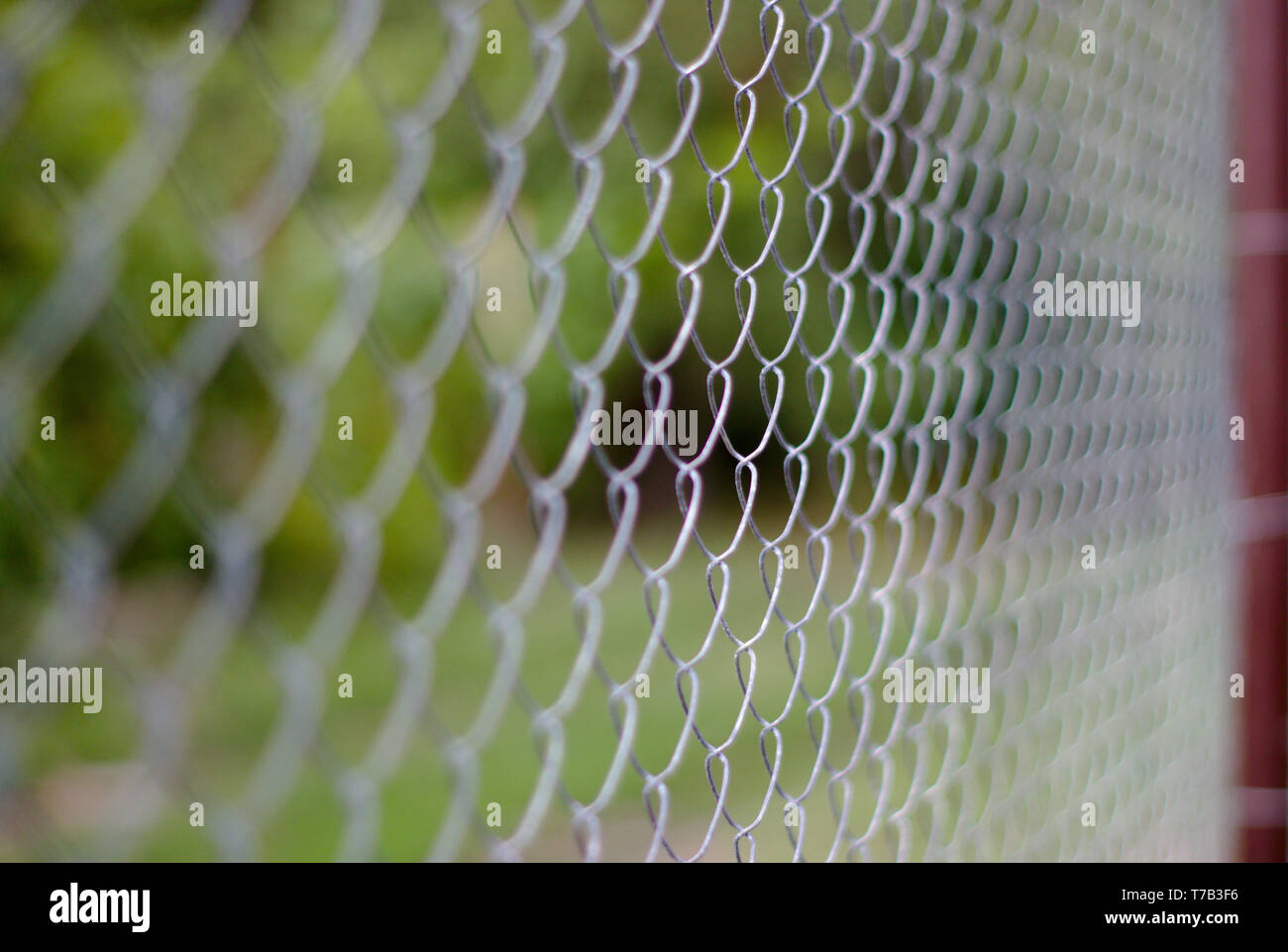 Abstract image of a mesh fence Stock Photo - Alamy
