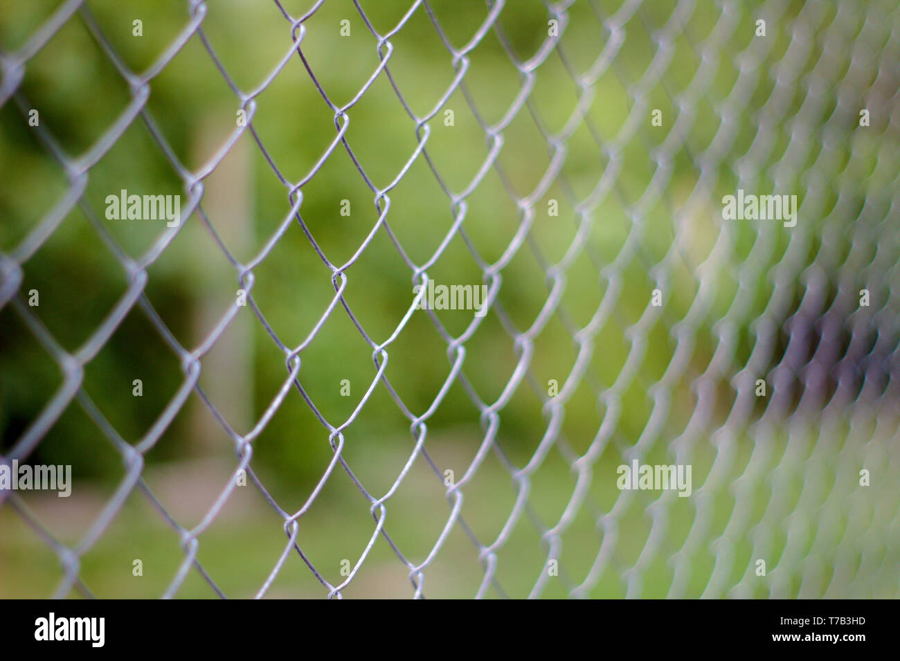 Abstract image of a mesh fence Stock Photo - Alamy