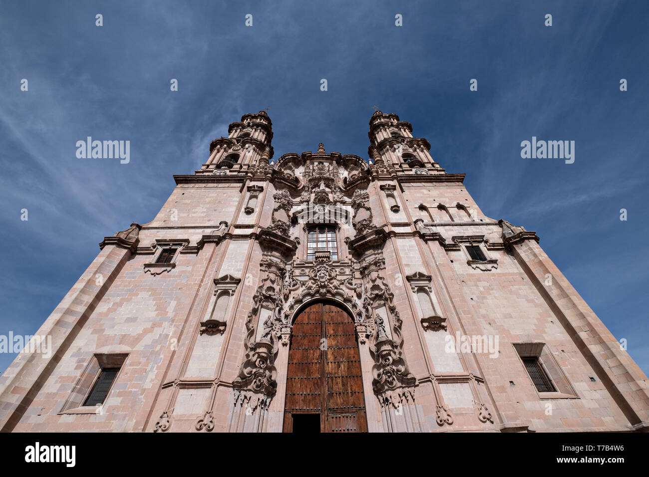 The ornate baroque facade of the Parish of Our Lady of the Assumption ...