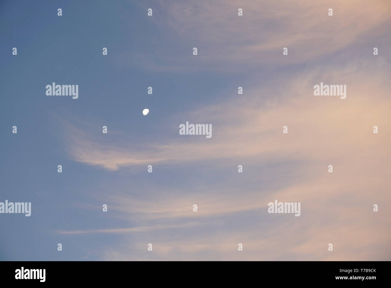 Cirrus clouds and moon Stock Photo - Alamy