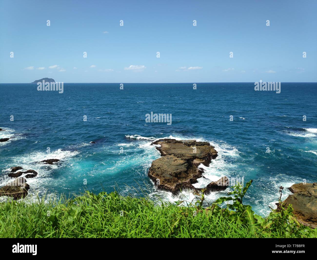 The beautiful beach with deep blue water and light blue sky and nice ...