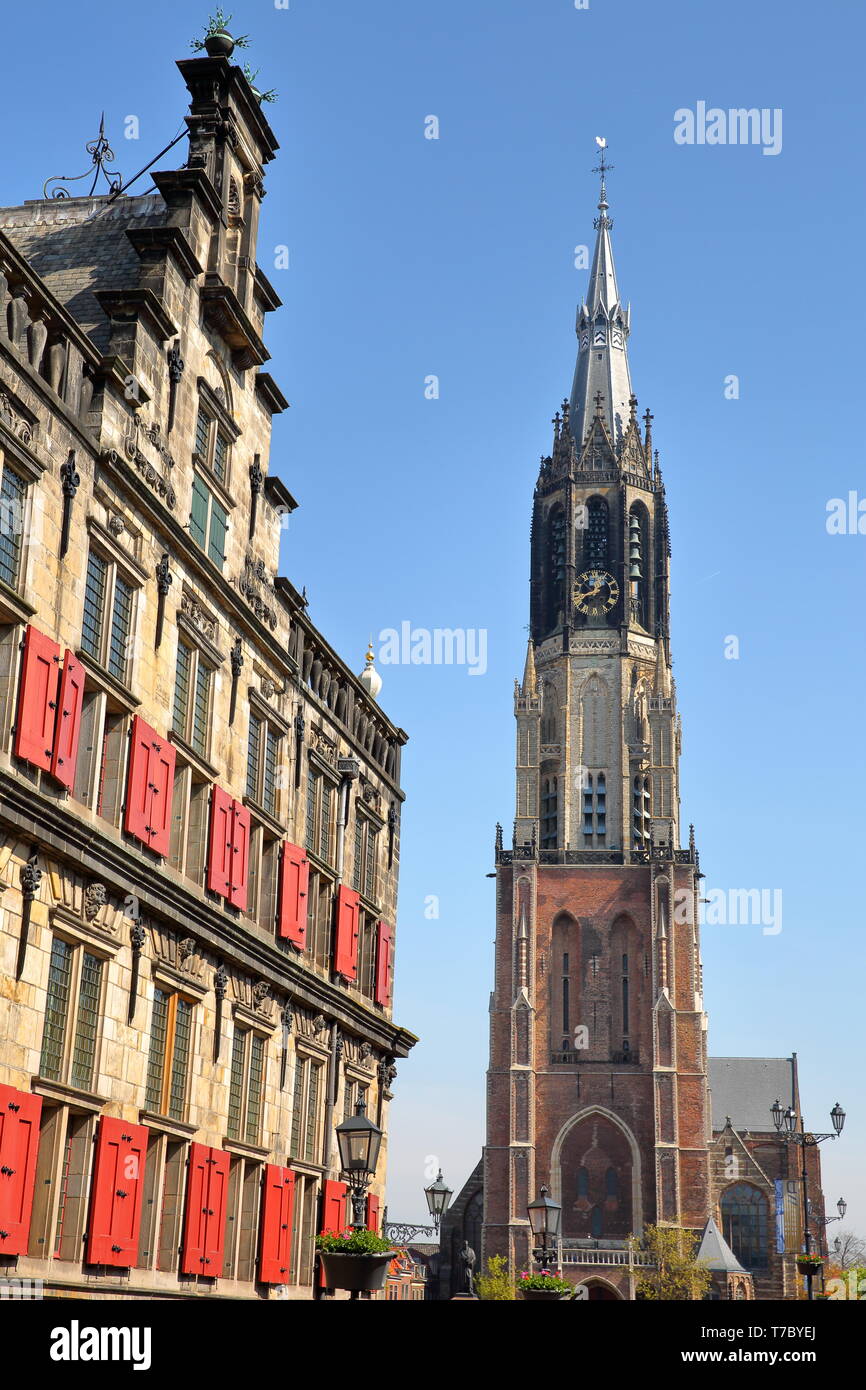 The external facade of the Town Hall (rebuilt in 1629) on the left and ...