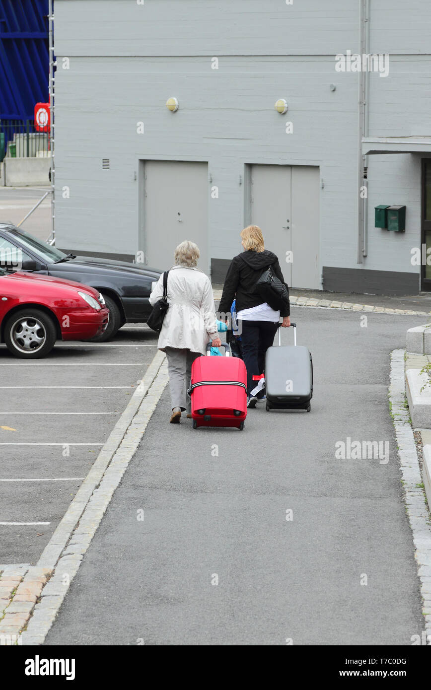 Family with baggage. Oslo, Norway Stock Photo - Alamy