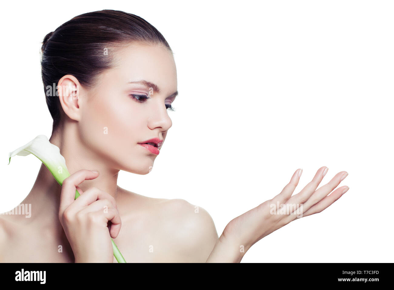Beautiful spa woman holding empty open hand isolated Stock Photo - Alamy