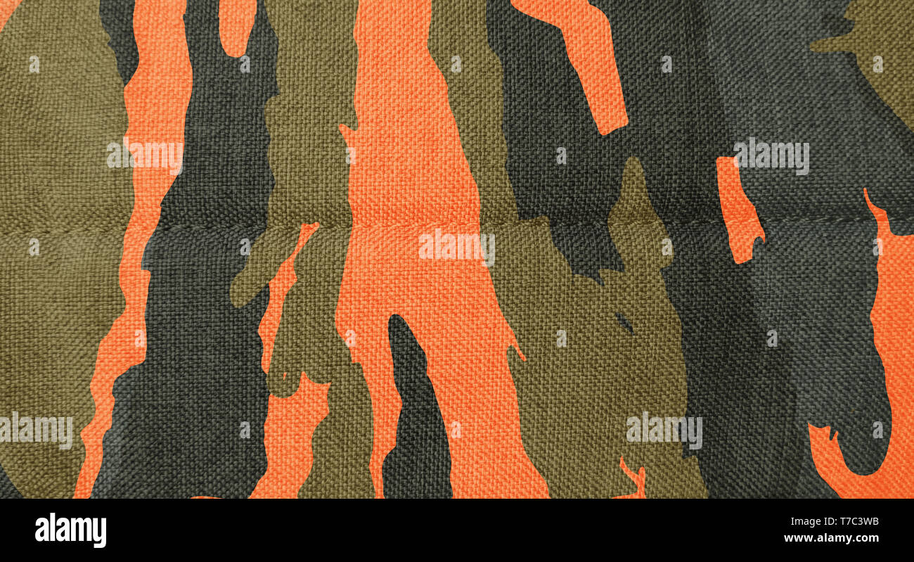 Camouflage pattern cloth texture. Abstract background and texture for ...