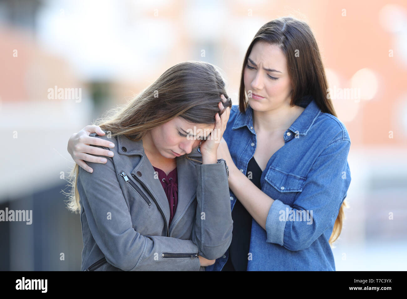 Comforting friend teenager student hi-res stock photography and images ...