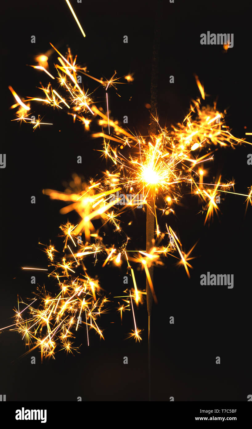 Christmas sparkle lights on dark background Stock Photo - Alamy