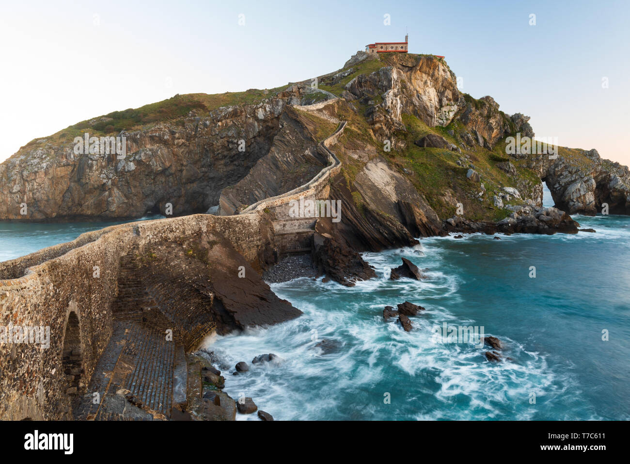 San Juan de Gaztelugatxe, its medieval stairs and bridge at sunrise ...
