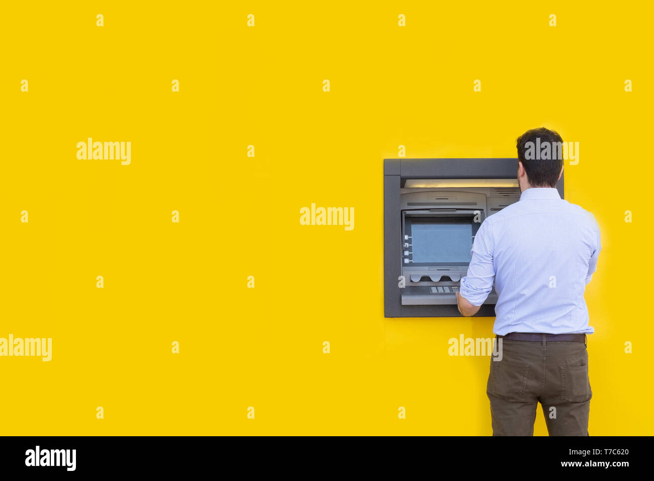 Man withdrawing money from cash machine hi-res stock photography and ...