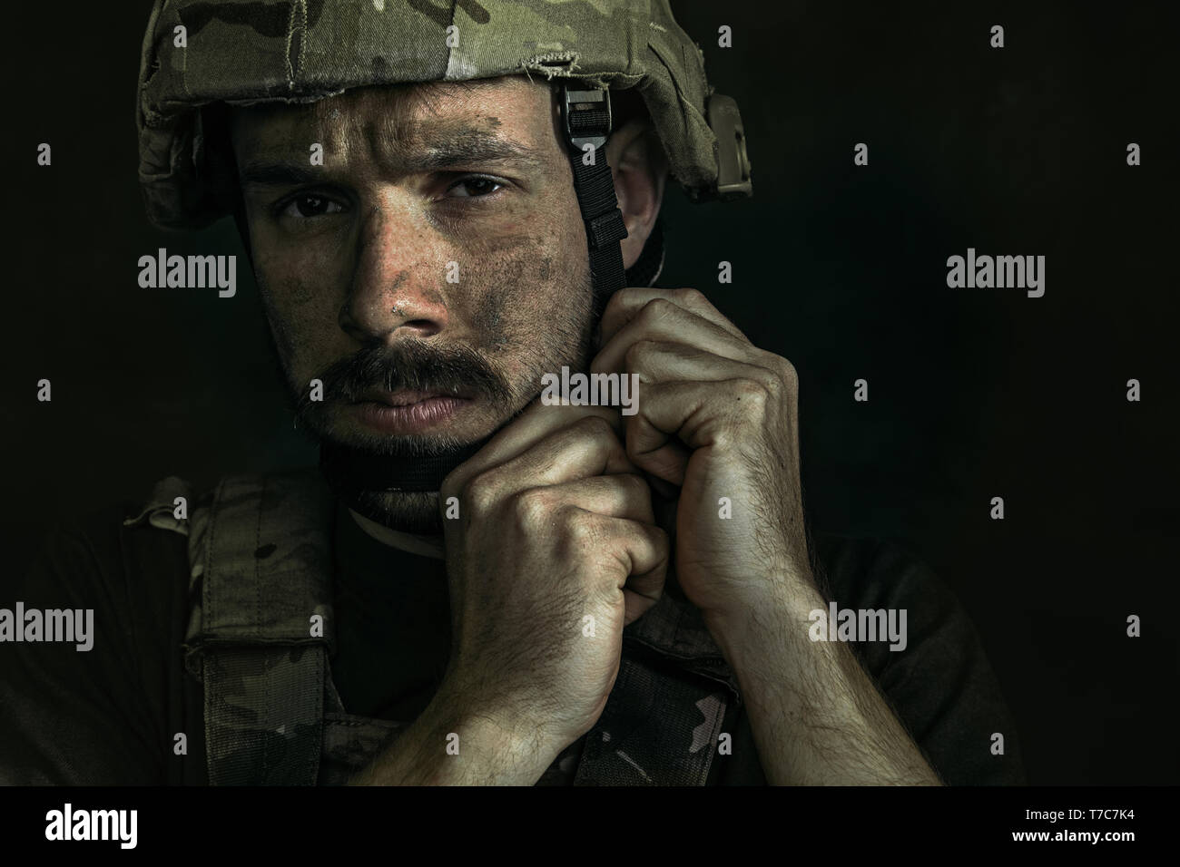 No room for choice. Close up portrait of young male soldier. Man in ...
