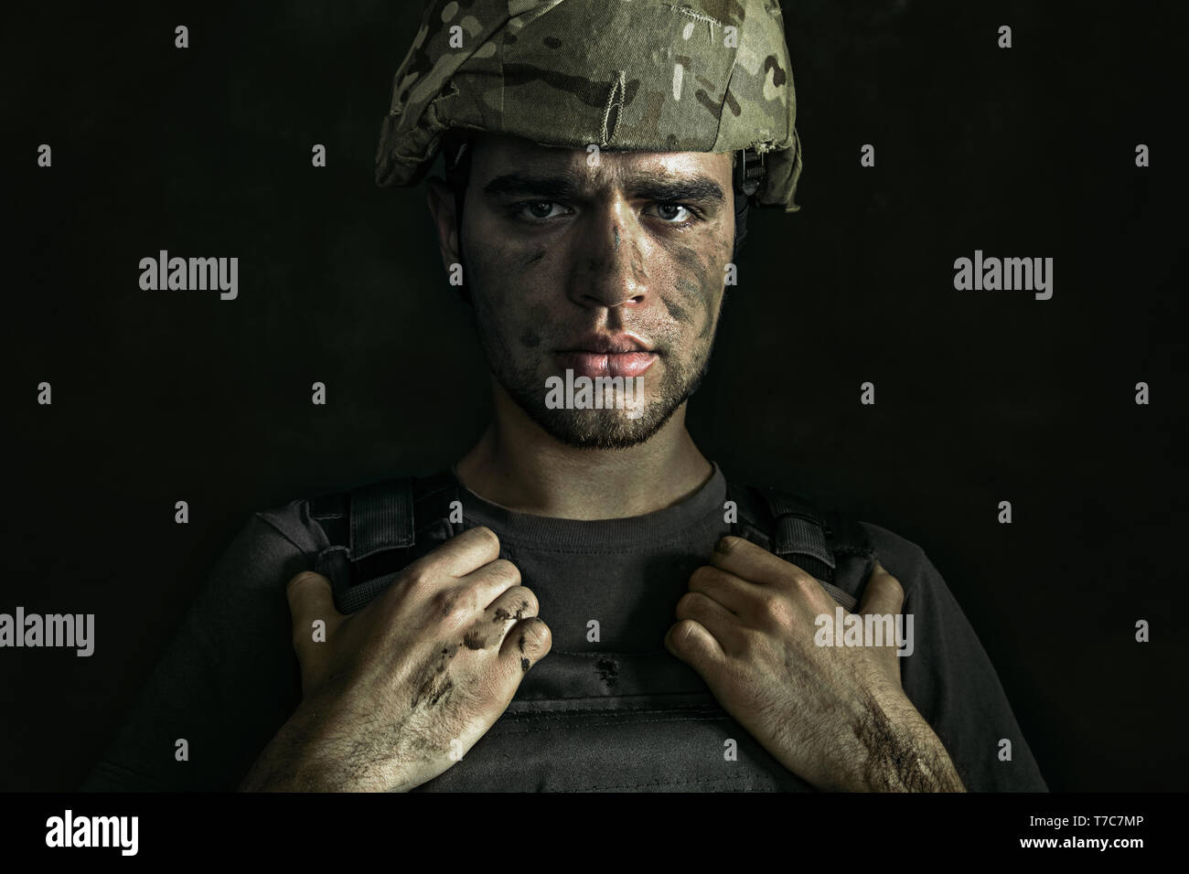 How can I feel alive again. Close up portrait of young male soldier ...
