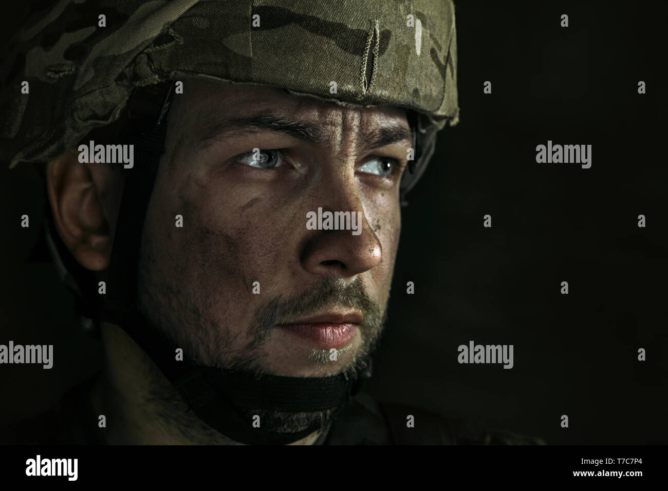 Is it any chance to return. Close up portrait of young male soldier ...
