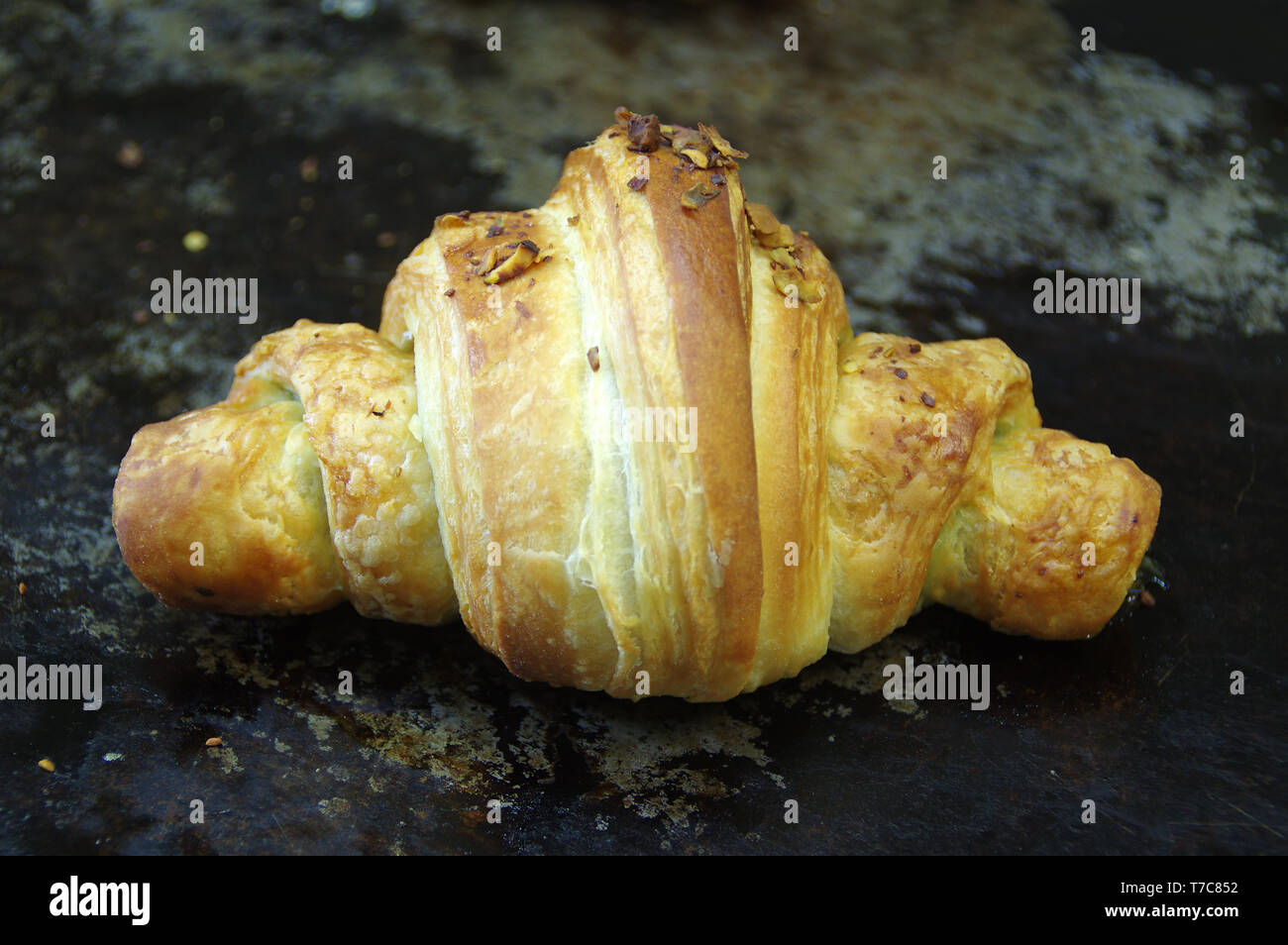 Hot croissant straight from the oven. Fresh french pastry Stock Photo ...