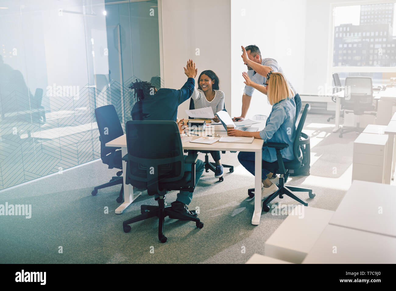 Excited coworkers hi-res stock photography and images - Alamy