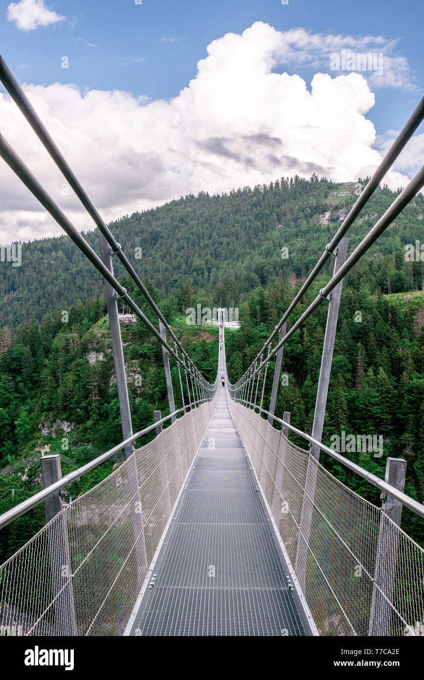 Suspension Bridge at Reutte between two hills in beautiful landscape ...