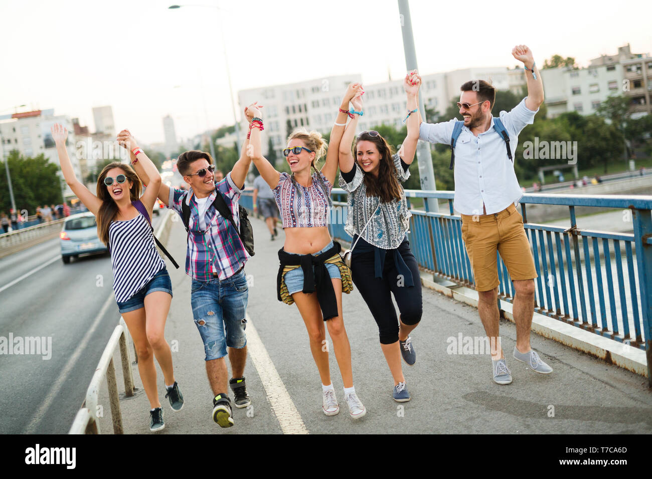 Picture of happy young friends hanging out together Stock Photo - Alamy