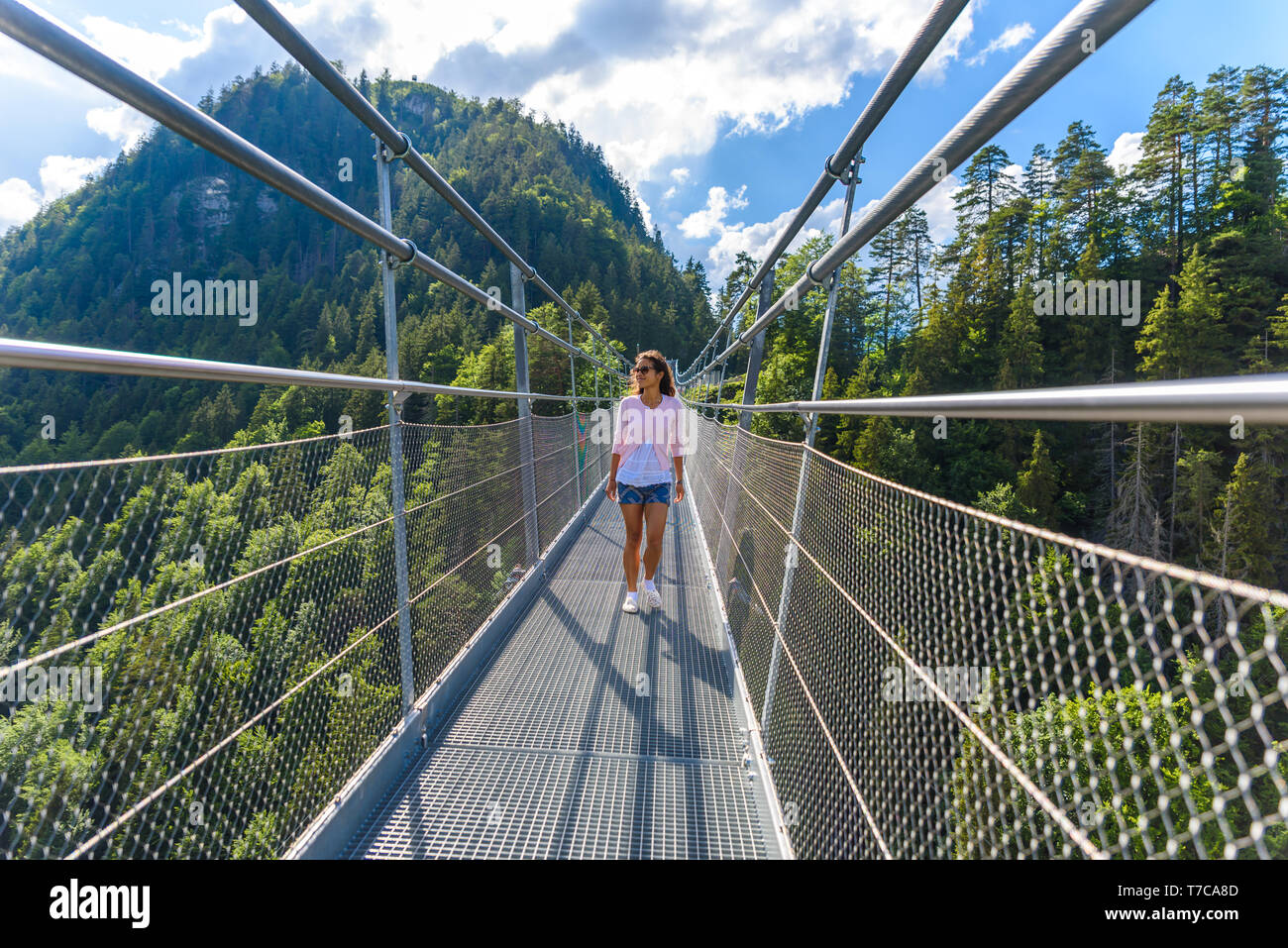 Suspension Bridge at Reutte between two hills in beautiful landscape ...