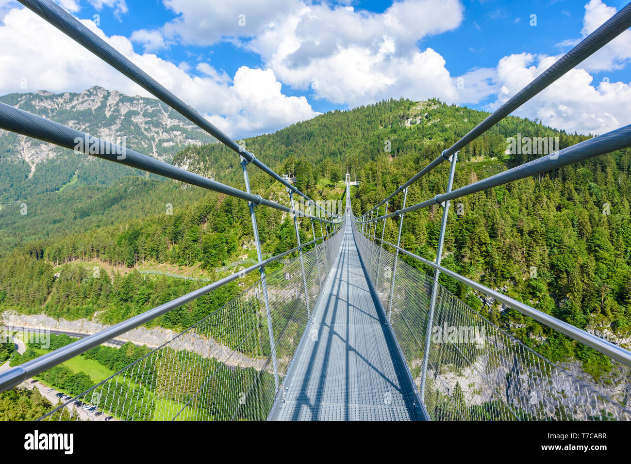 Suspension Bridge at Reutte between two hills in beautiful landscape ...