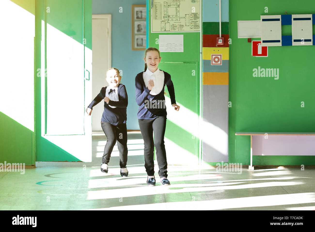 Schoolgirls running hi-res stock photography and images - Alamy