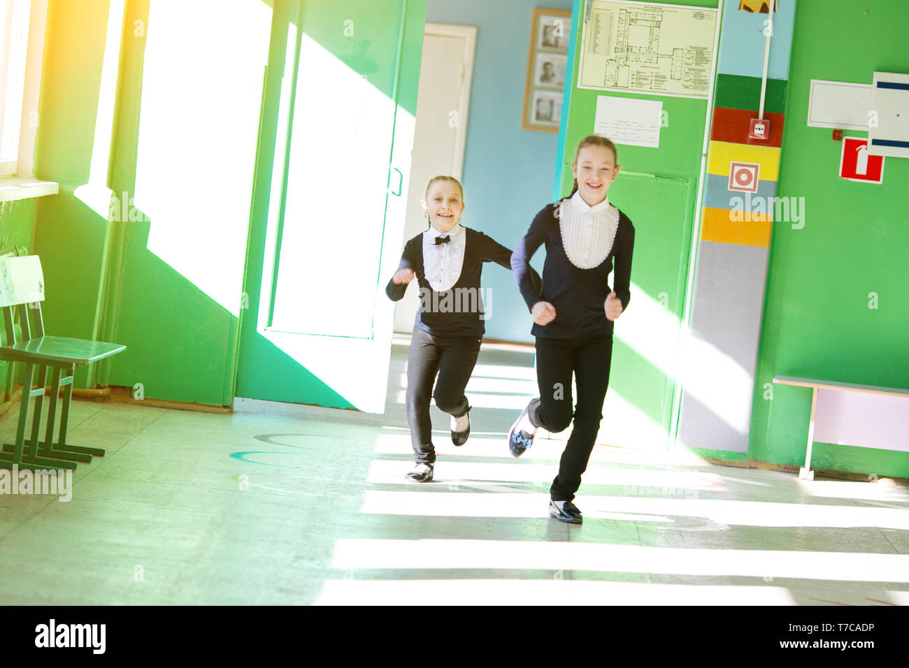 Schoolgirls running hi-res stock photography and images - Alamy