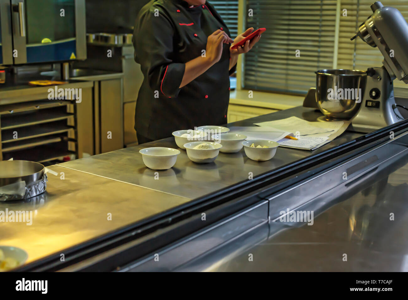 Pastry chef prepares cake and pastries Stock Photo - Alamy