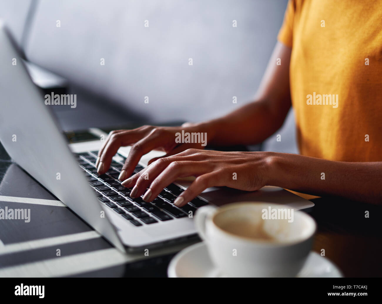 Woman hand holding laptop typing hi-res stock photography and images ...
