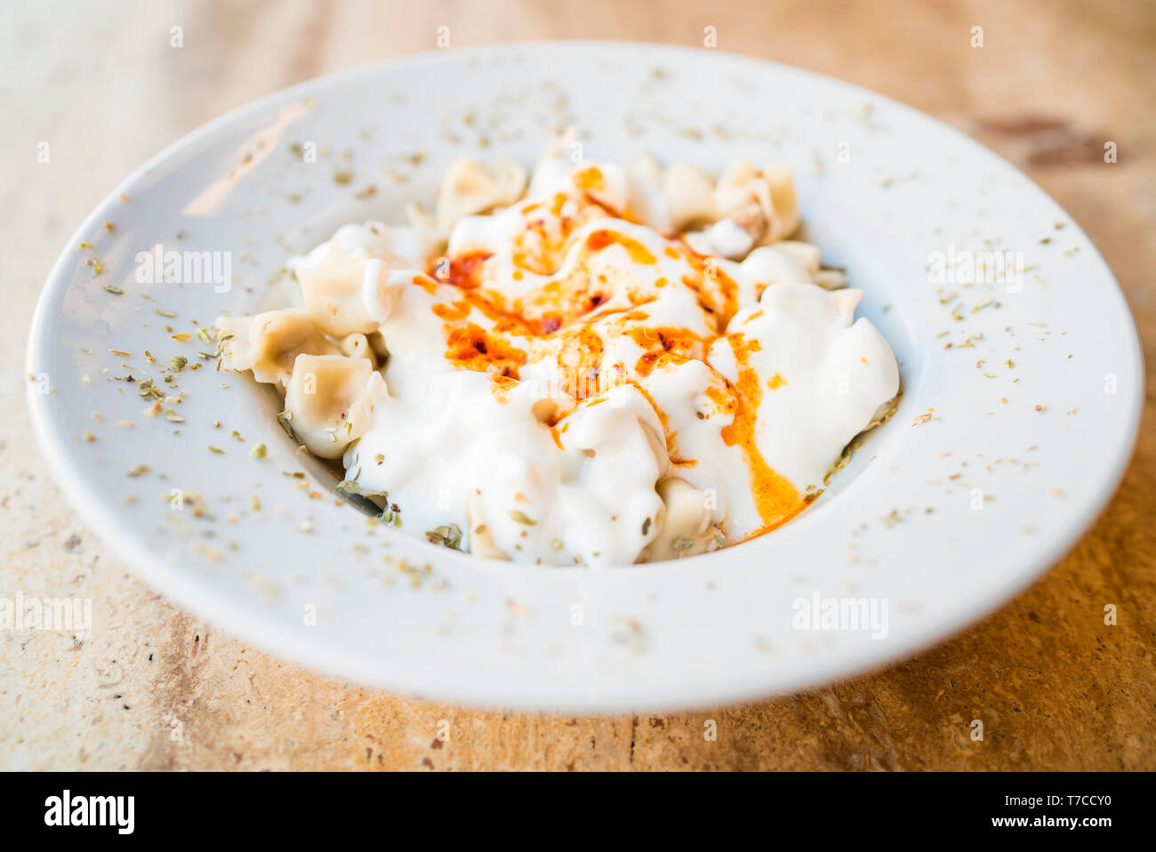 Turkish Mant, traditional turkish food, sauce with yogurt on the ...