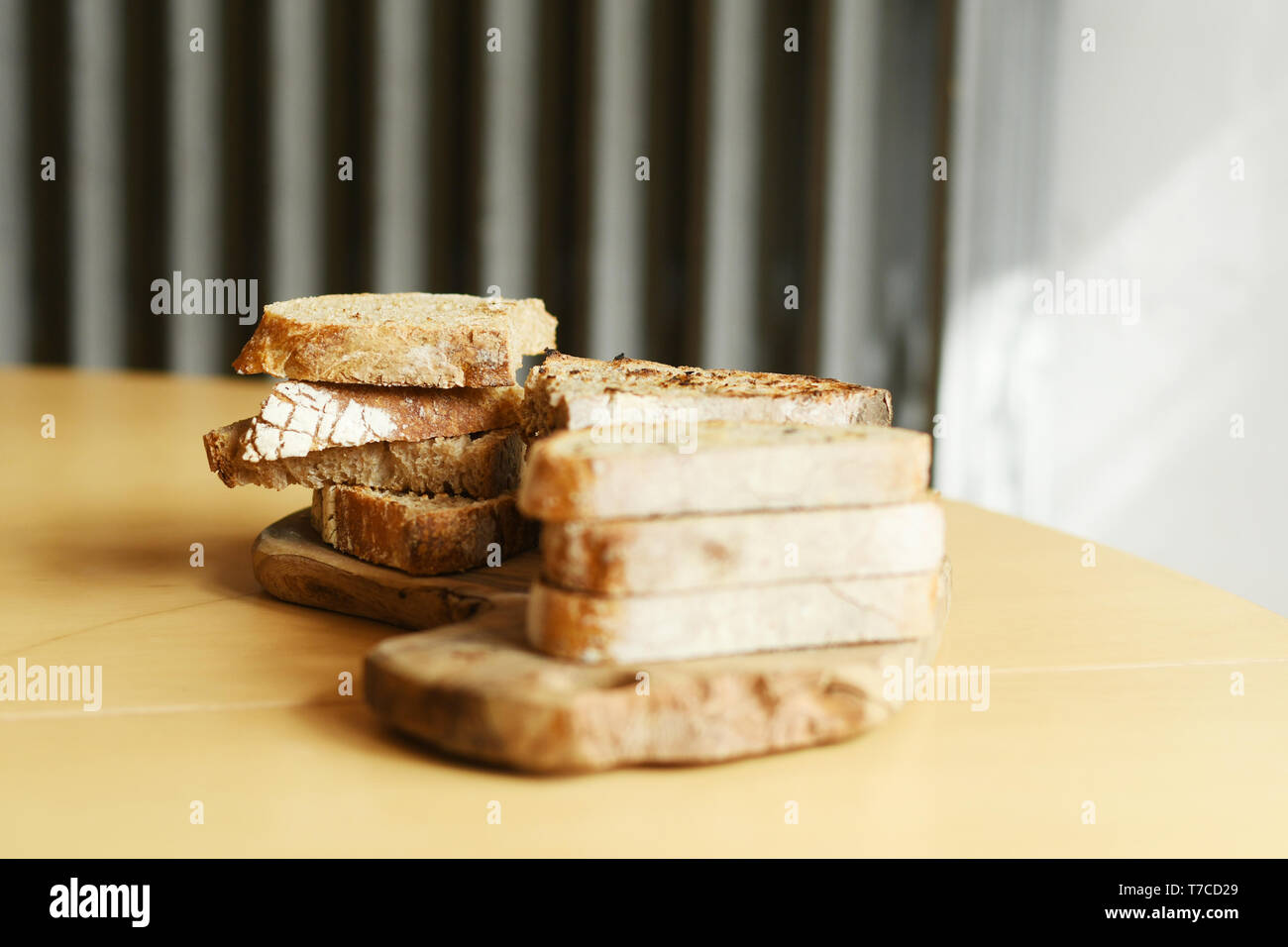 Pile of bread lying on the table with copyspace Stock Photo - Alamy