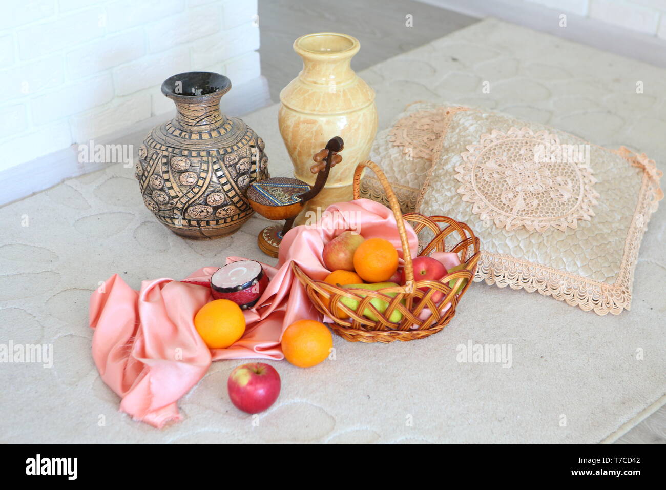 Oriental still life with jugs, oranges and Turkish musical instruments ...
