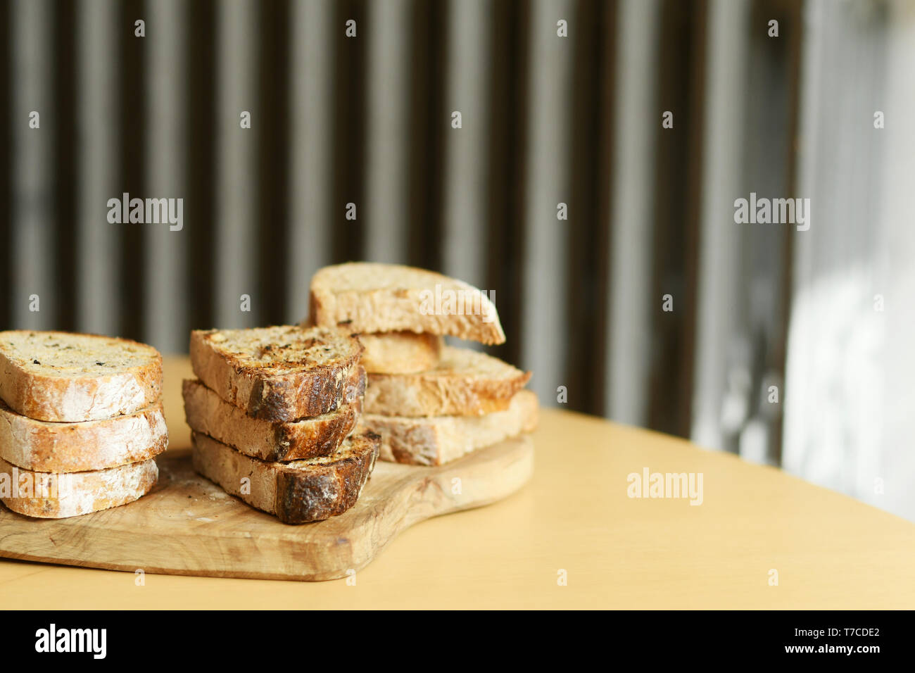 Pile of bread lying on the table with copyspace Stock Photo - Alamy