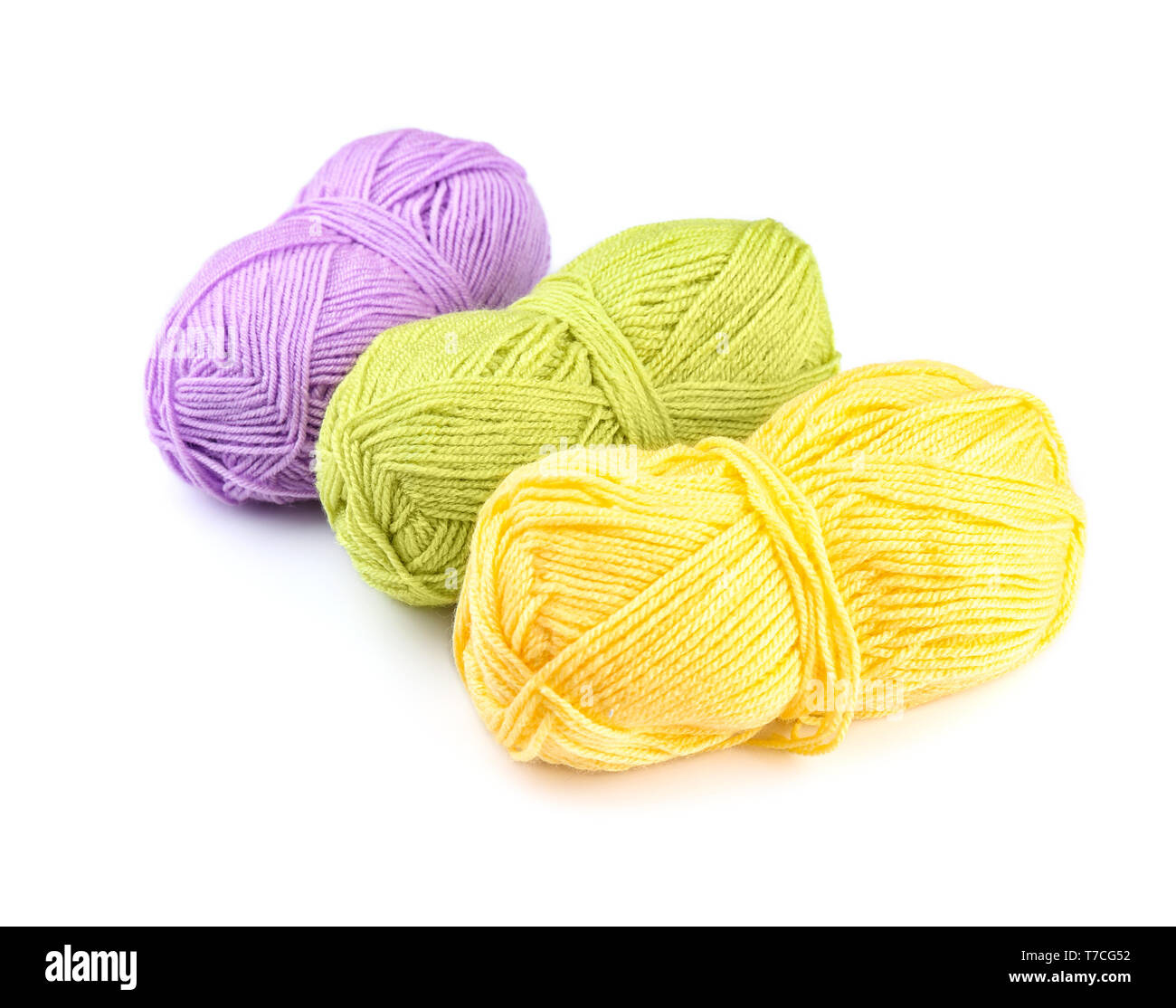 Colorful knitting yarn on white background Stock Photo - Alamy