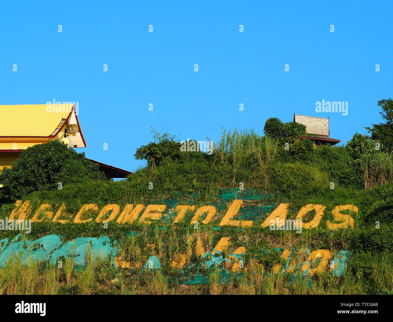 Welcome to Laos lettering in ground directly after the border crossing ...