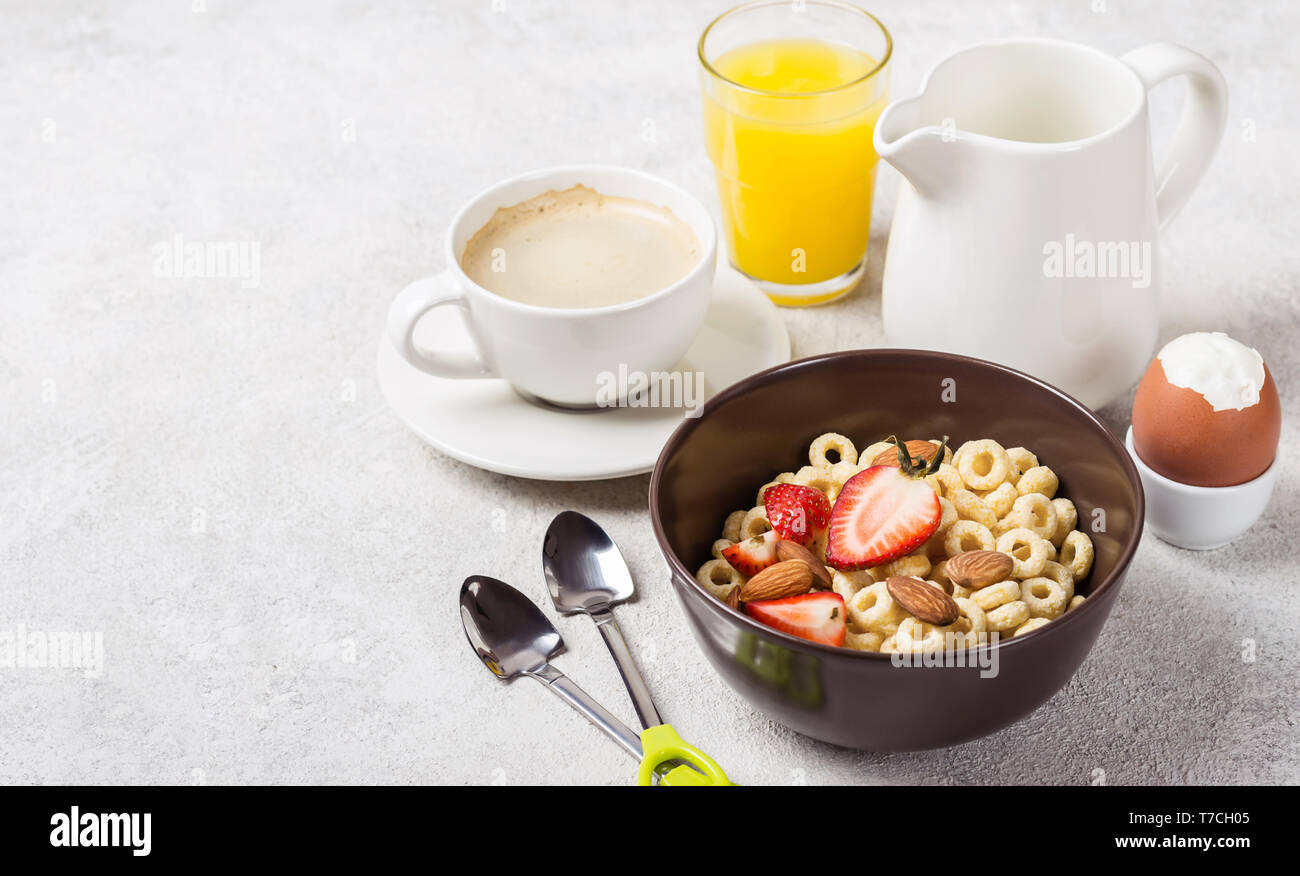 Healthy traditional breakfast. Whole grain rings cheerios, coffee ...